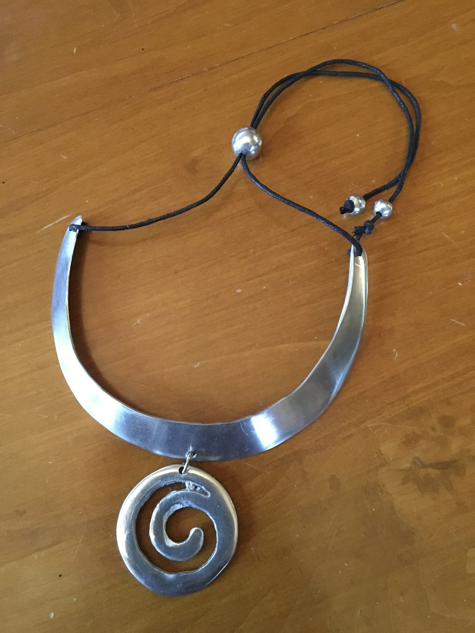 Adjustable aluminum necklace with spiral pendant. – Southern Exposure Style